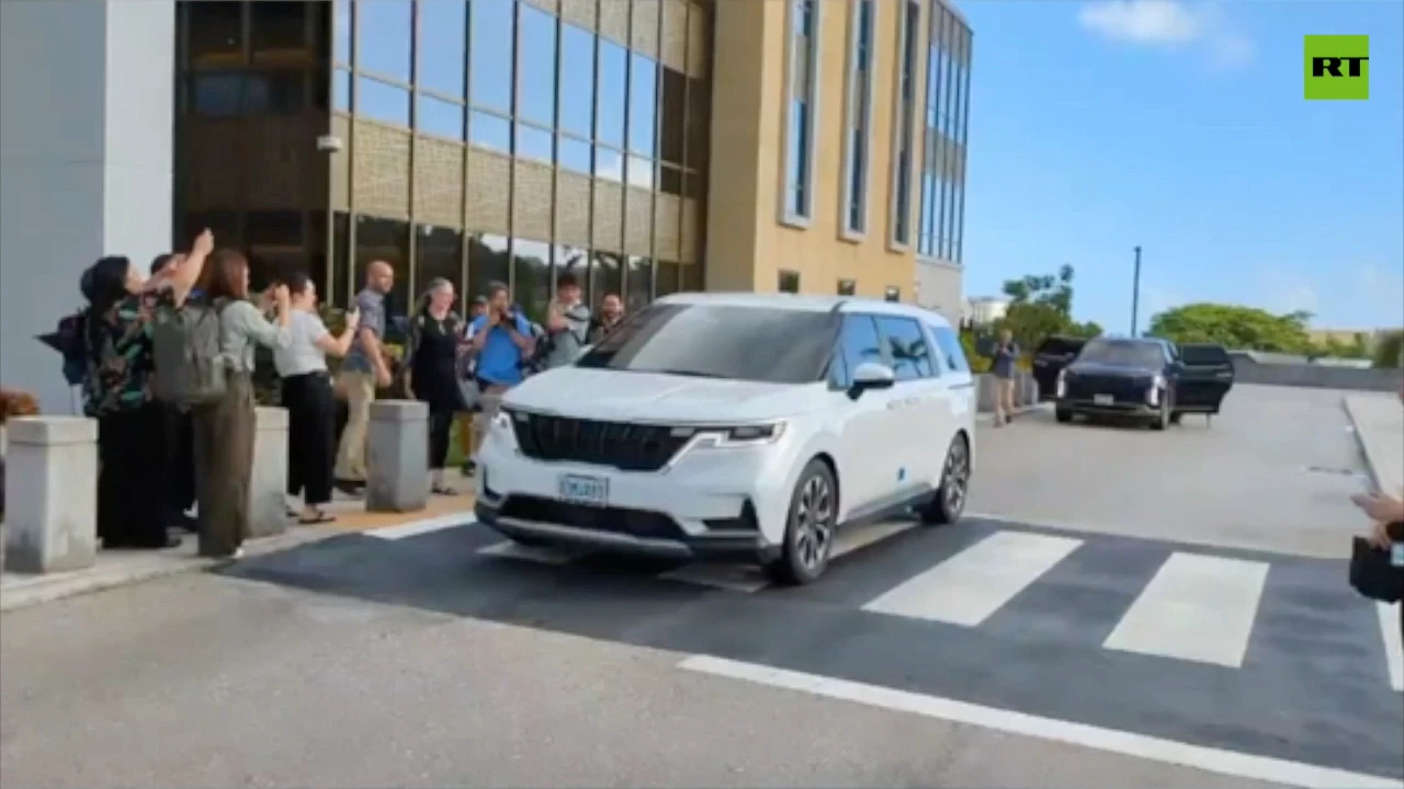 Assange arrives at courthouse on the US-administered island of Saipan