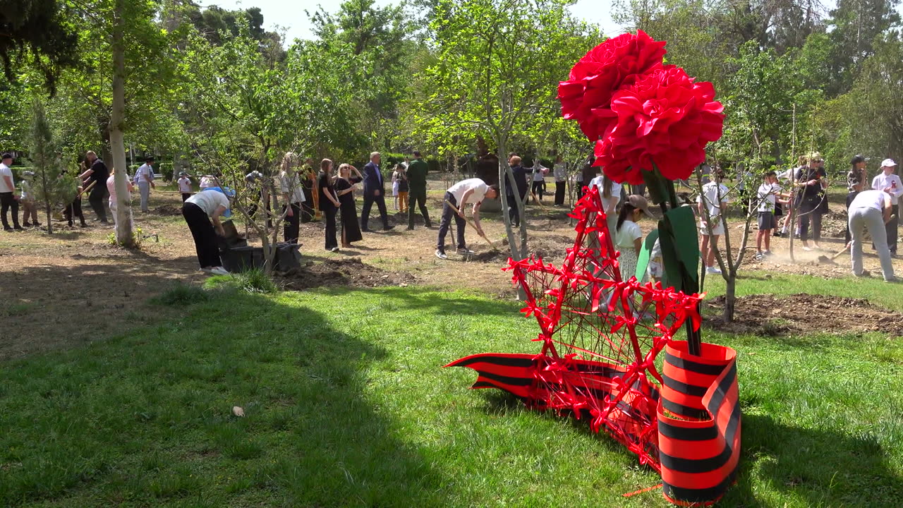 Victory Day: Russian embassy roll up sleeves to plant trees in Tehran